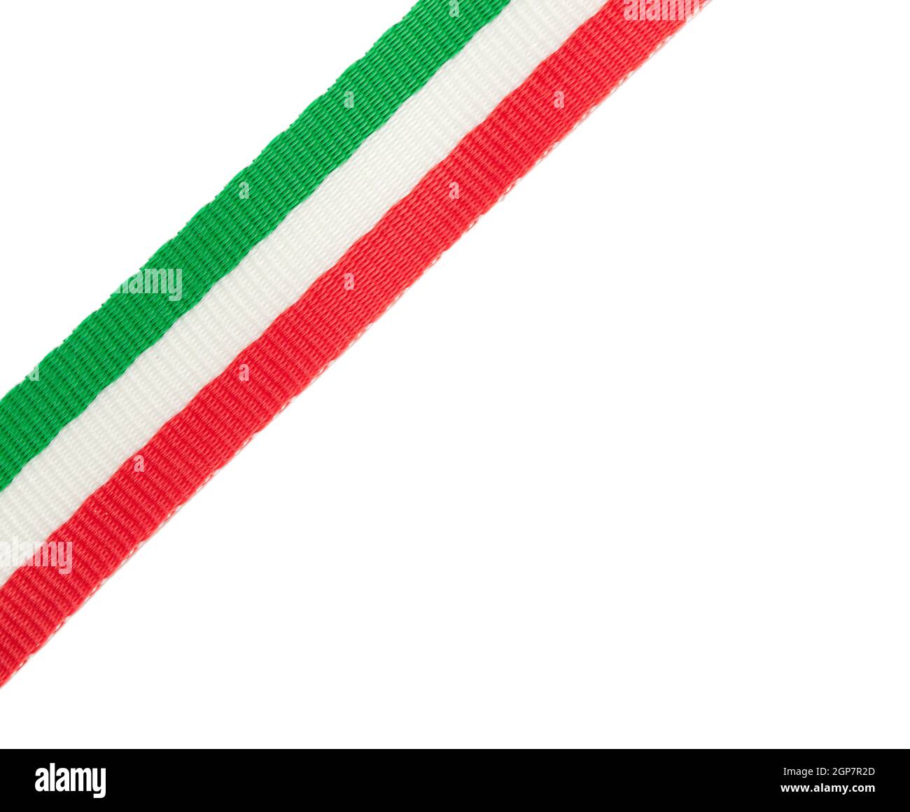 tricolor ribbon of the Italian flag placed in the corner on white ...