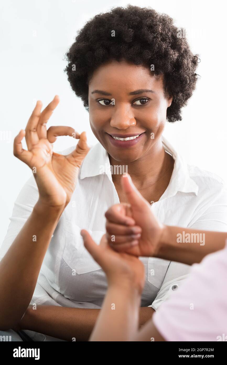 African American Kid Learning Deaf Sign Language Stock Photo - Alamy