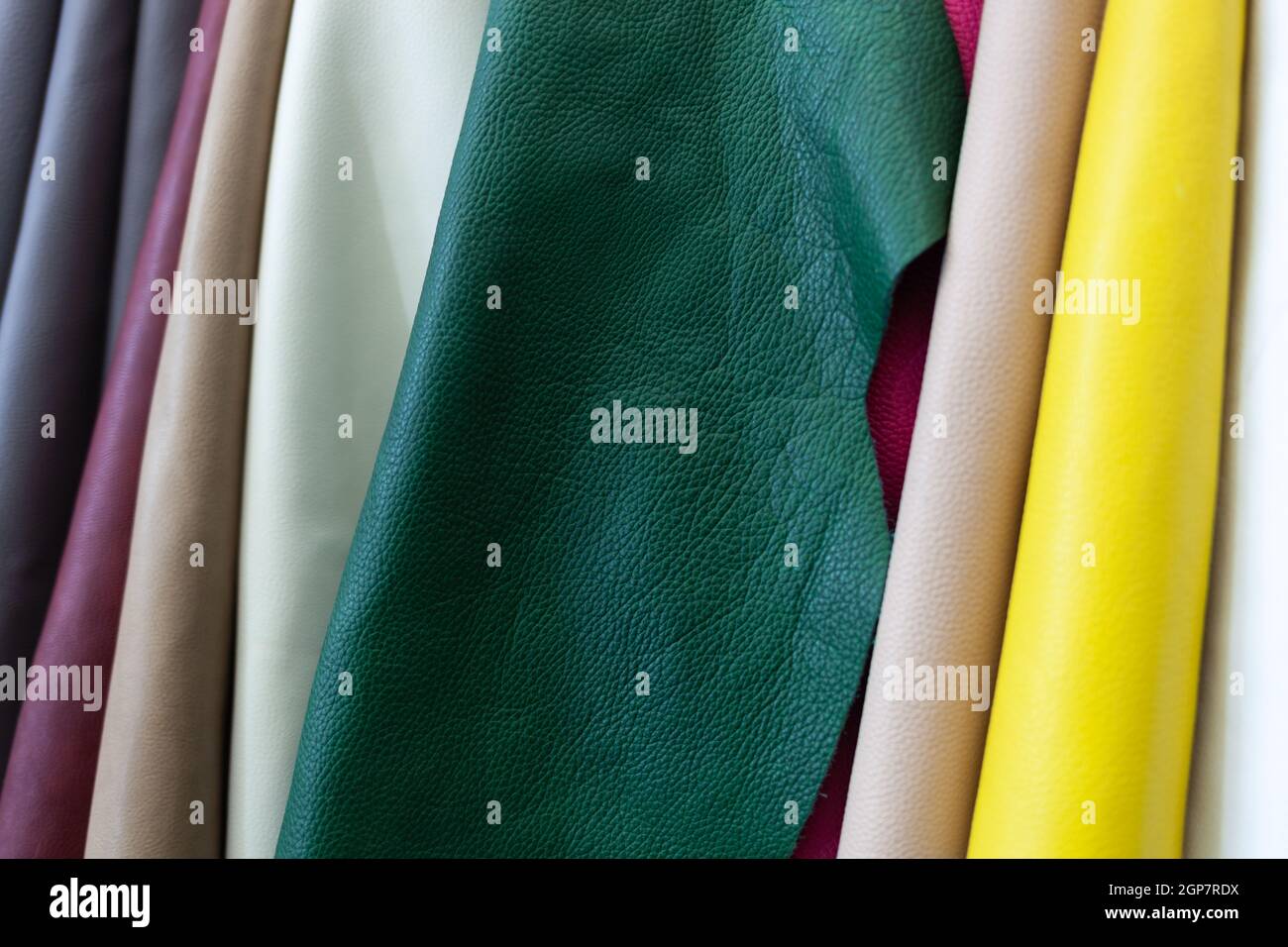 Different types and colors of leathers ready for the manufacture of ...