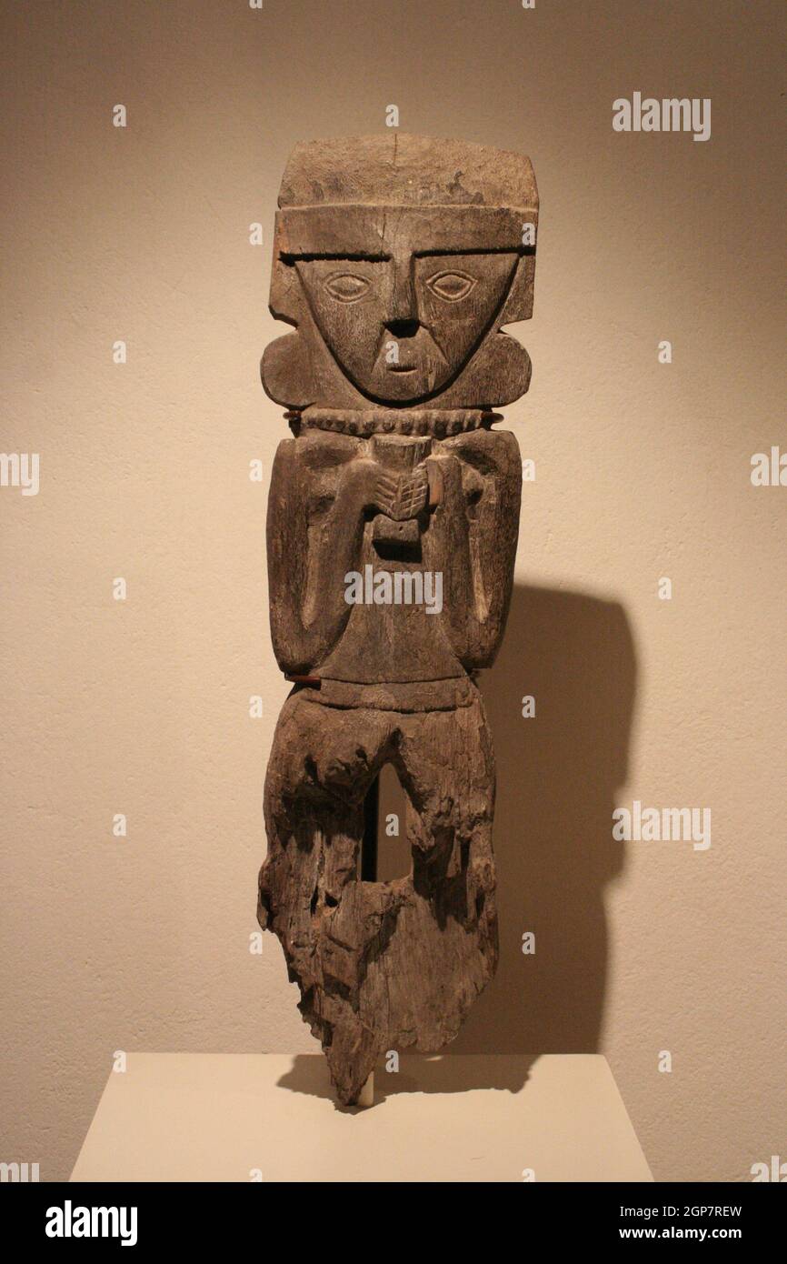 Wooden carving of a human figure at the Museum of Pre-Columbian Art ...