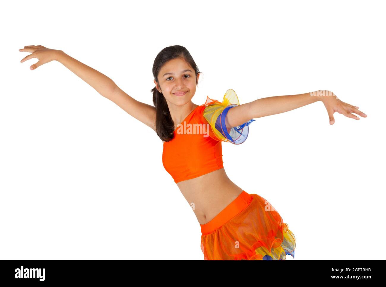 Teenage girl dancing with Latin American clothing on white background ...