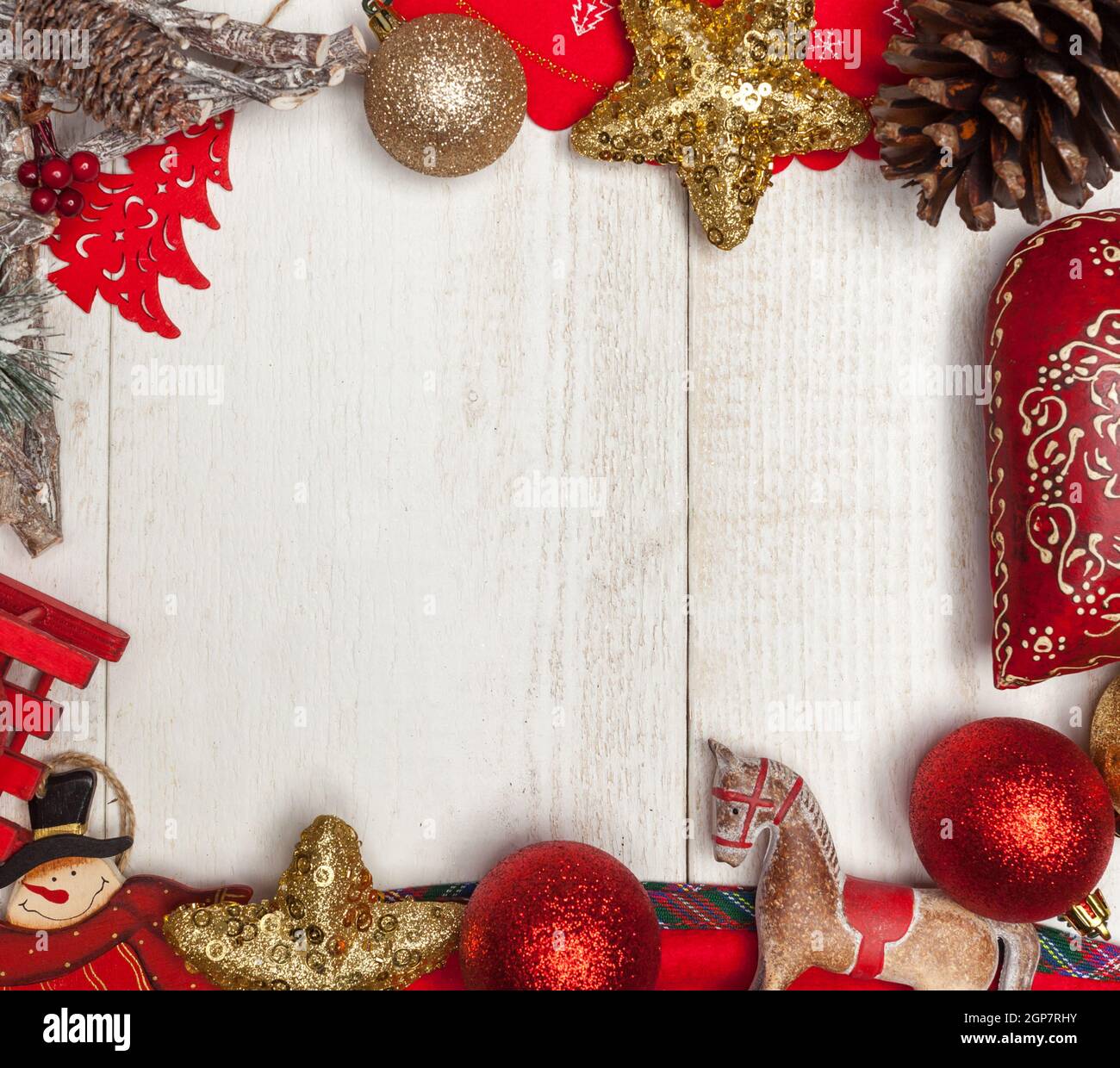 Christmas frame on rustic white wood background and decorative objects ...