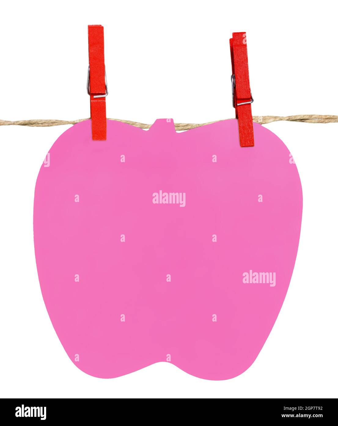Notepad shaped apple hanging from a rope on white Stock Photo - Alamy