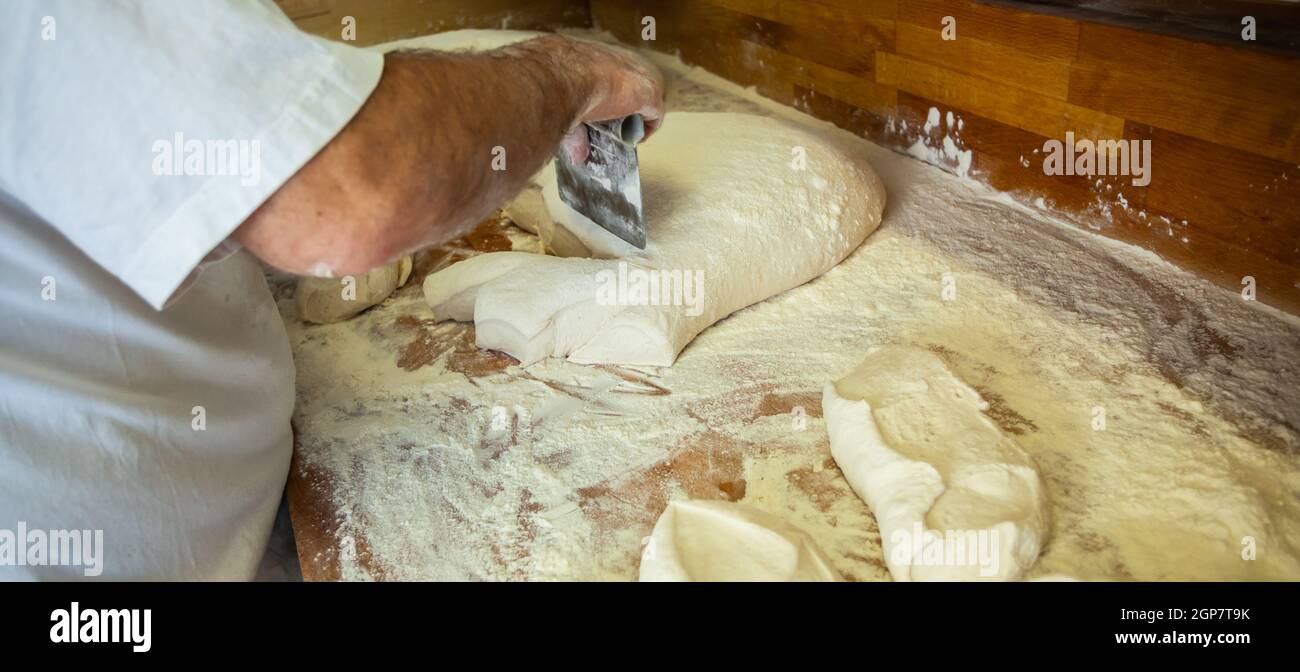 Daily production of bread baked with wood oven with traditional method ...