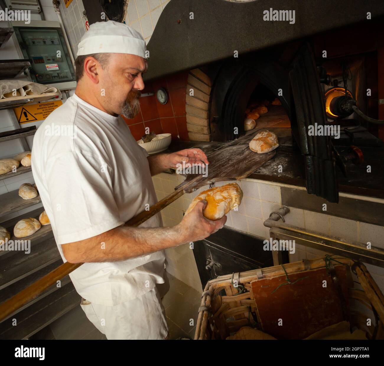 Daily production of bread baked with wood oven with traditional method ...