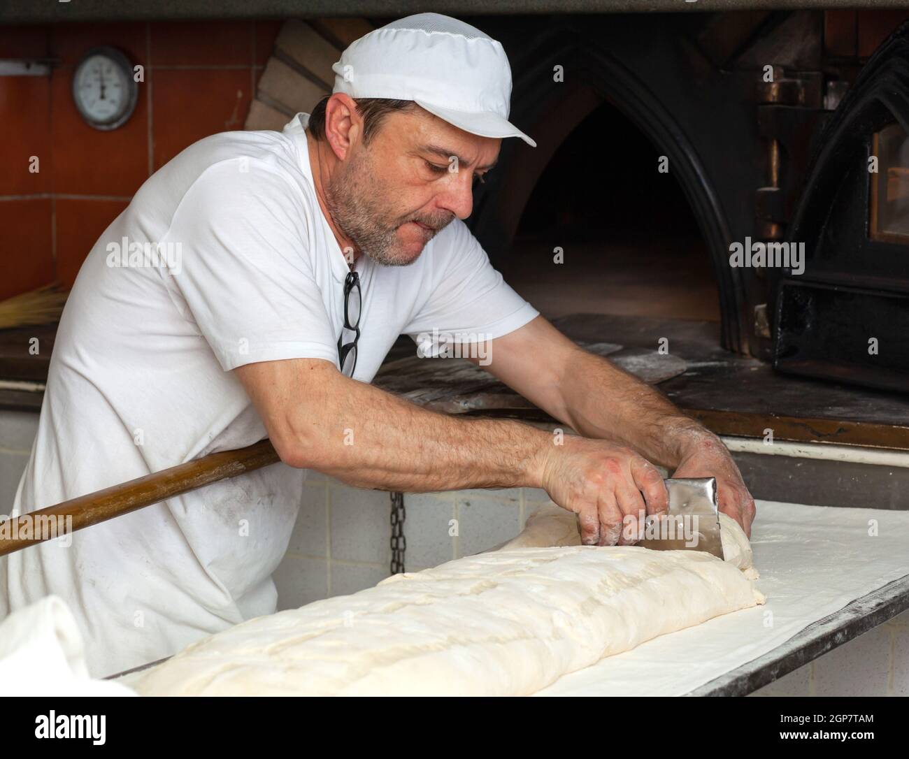 Daily production of bread baked with wood oven with traditional method ...