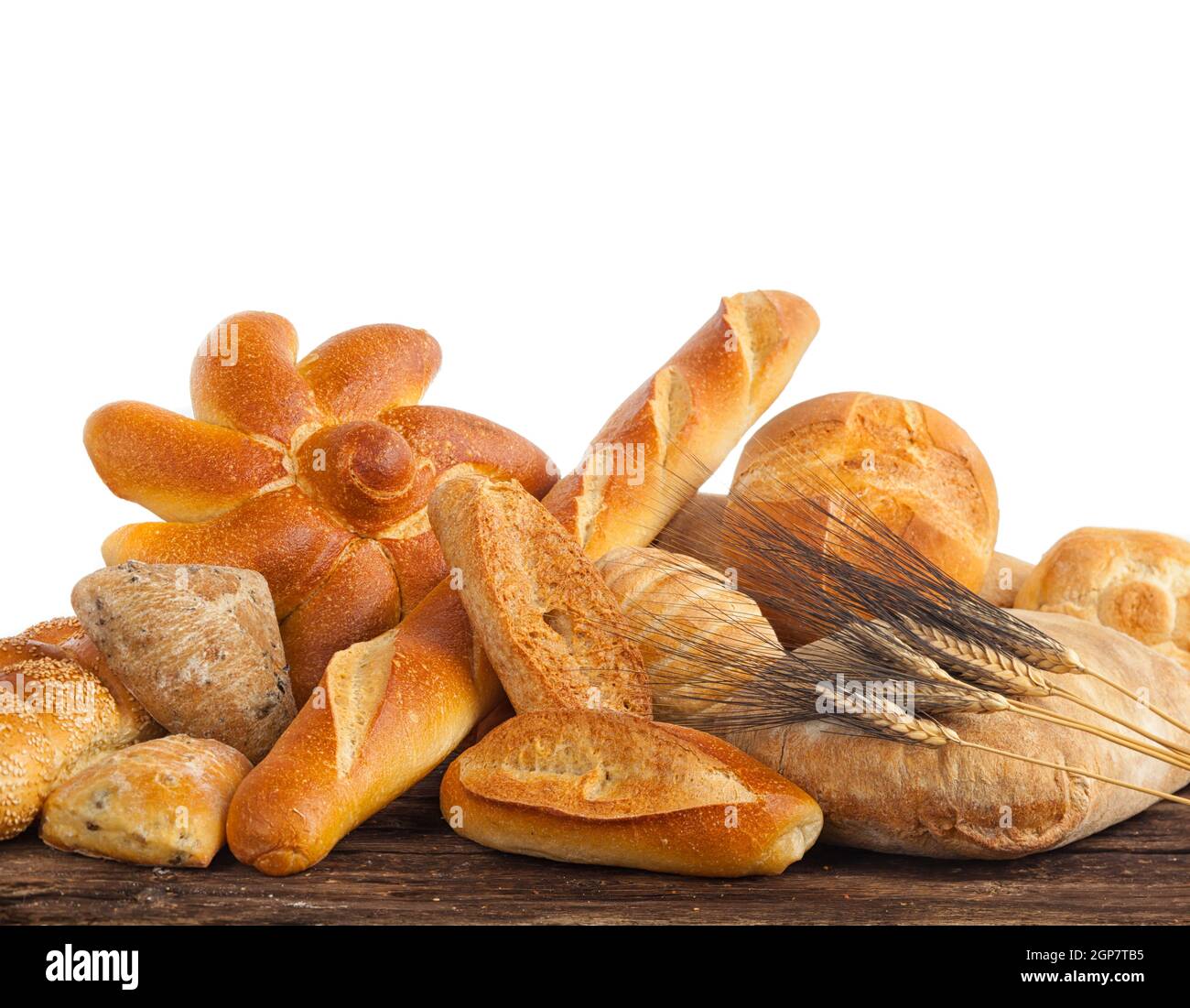 Variety types of bread on wood table Stock Photo - Alamy