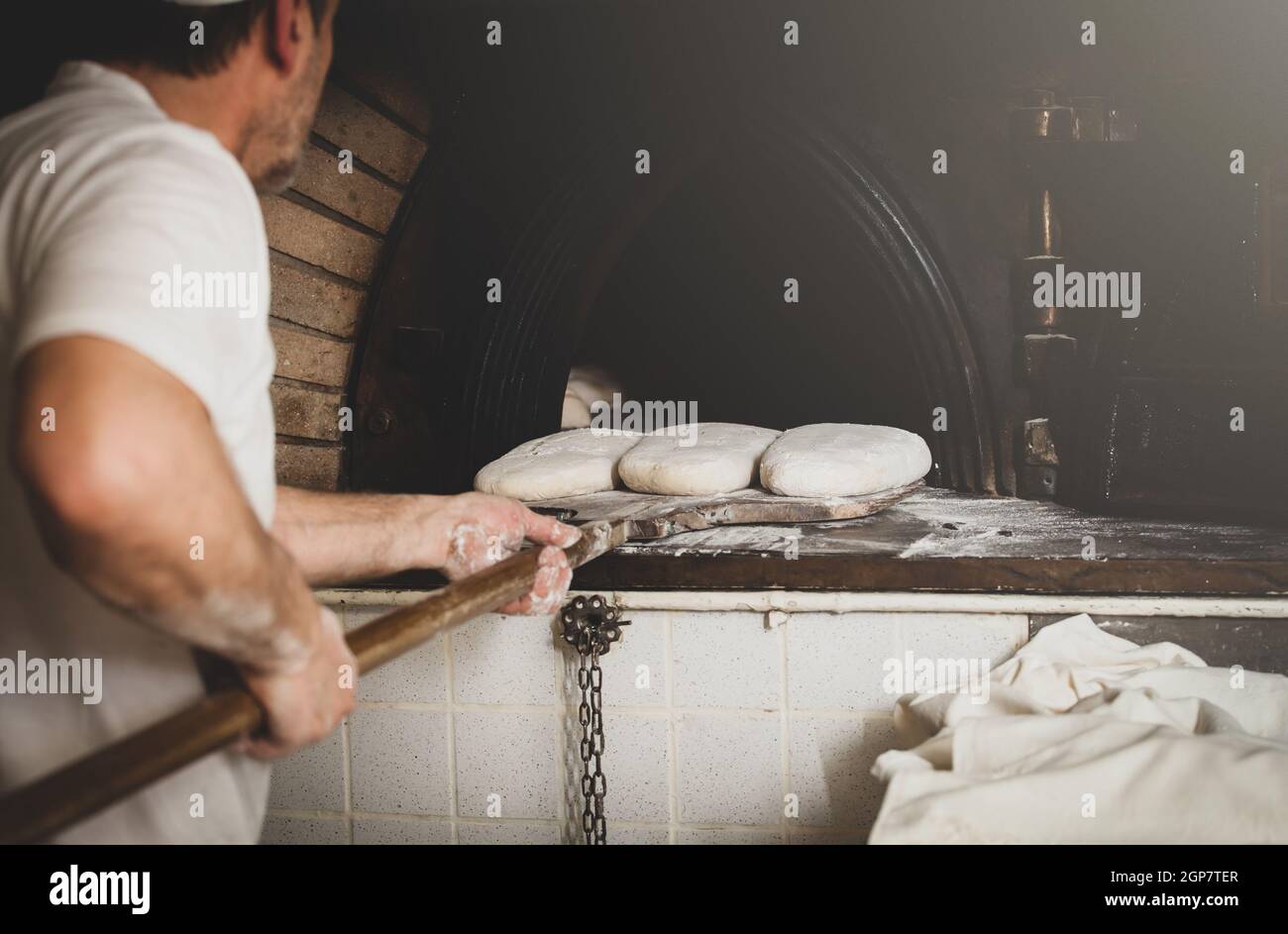 Daily production of bread baked with wood oven with traditional method ...