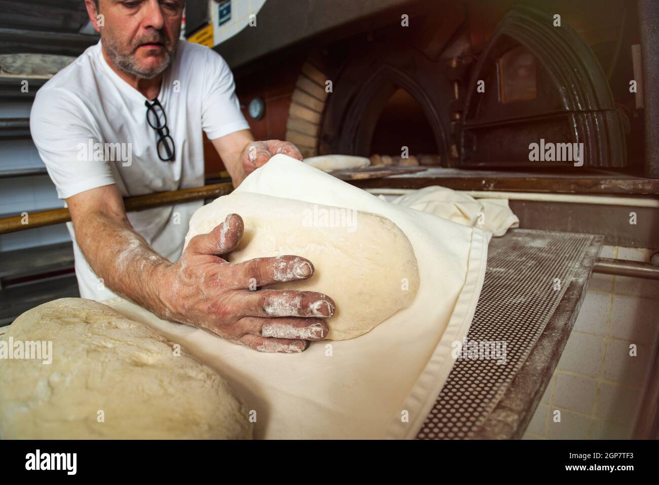 Daily production of bread baked with wood oven with traditional method ...
