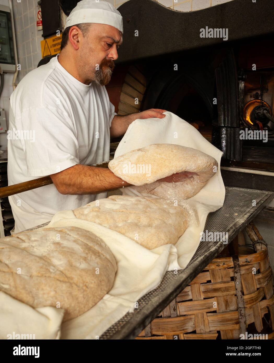 Daily production of bread baked with wood oven with traditional method ...