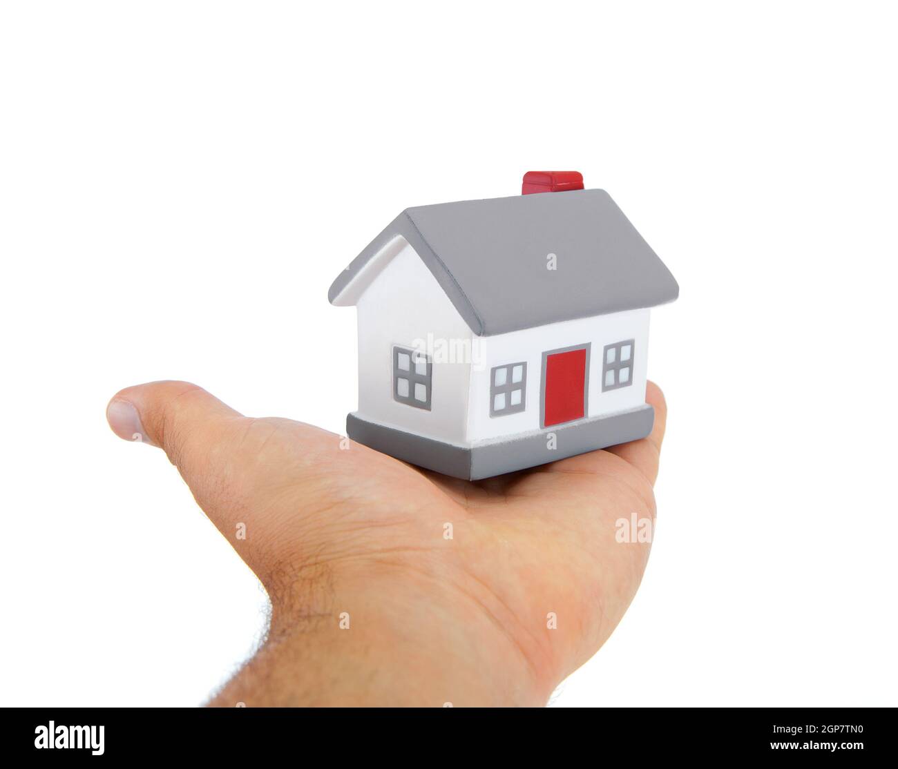 House model toy plastic in hand on white background Stock Photo - Alamy
