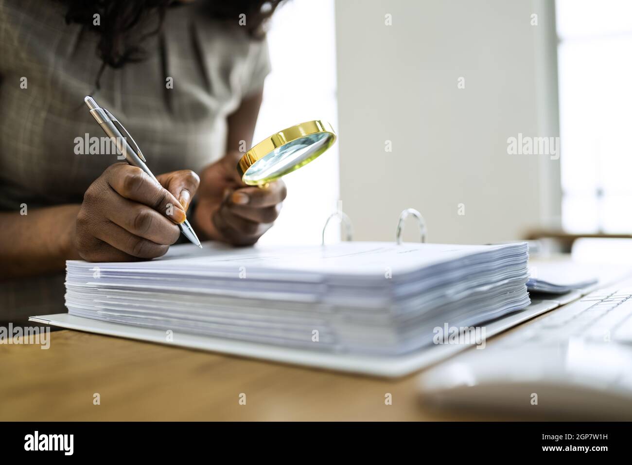 Business Fraud Investigation. Auditor Using Magnifying Glass To ...