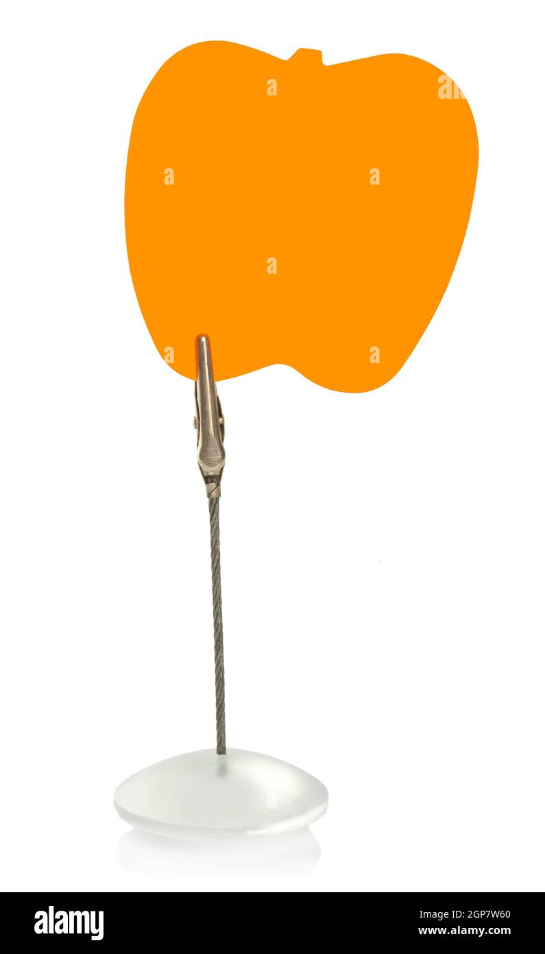 Apple shaped notepad on support with clothespin on white background ...