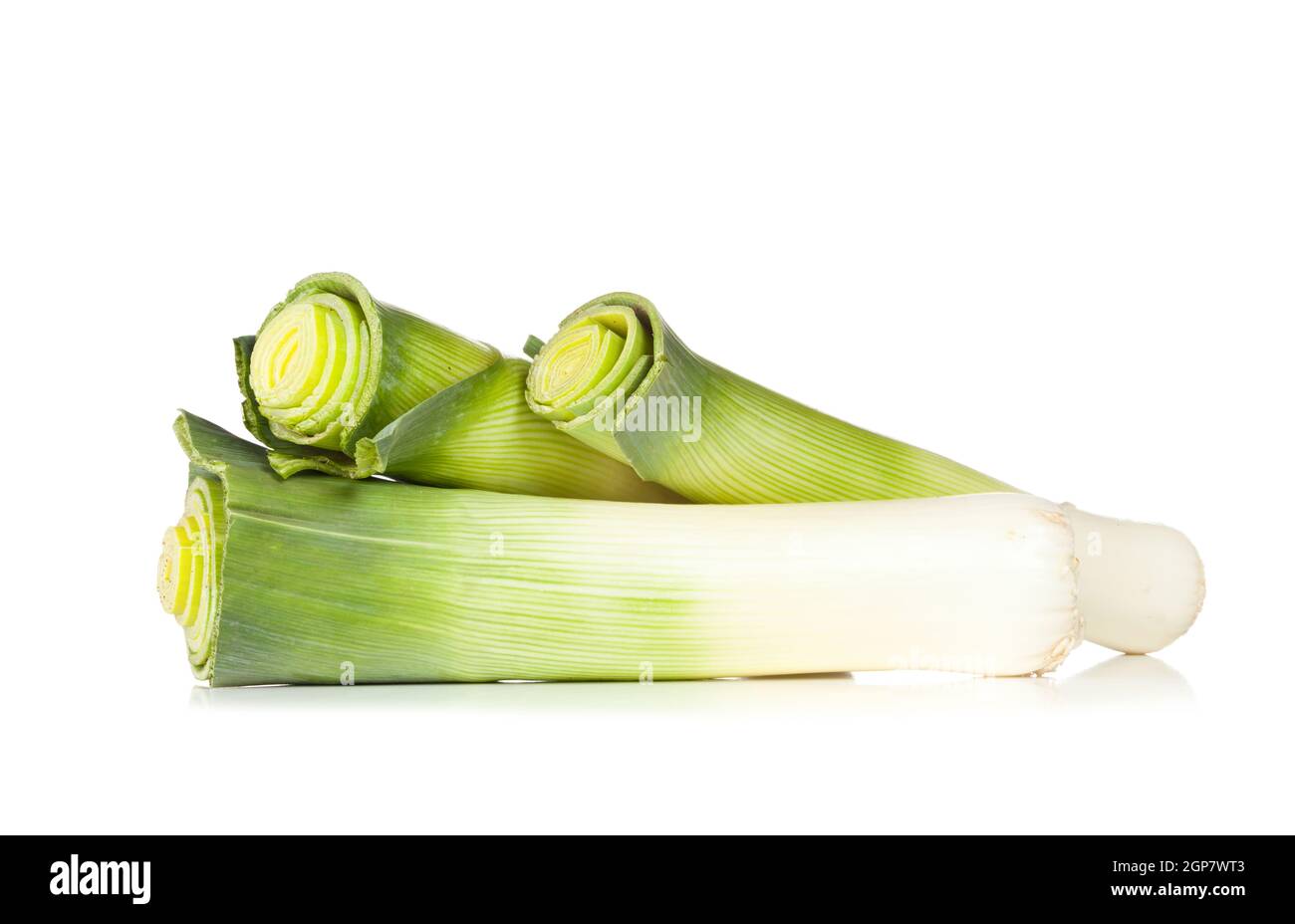 Leek vegetable closeup isolated on white background Stock Photo - Alamy