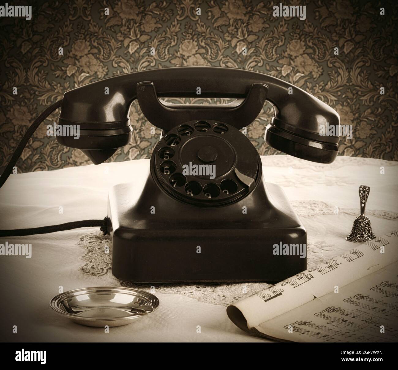 Old retro bakelite telephone on white background Stock Photo - Alamy