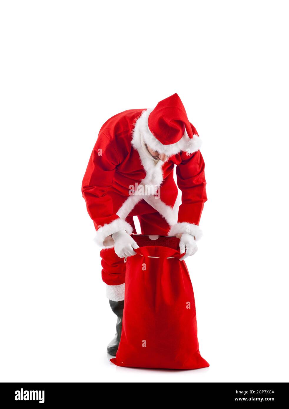 Santa Claus standing isolated on white background Stock Photo - Alamy
