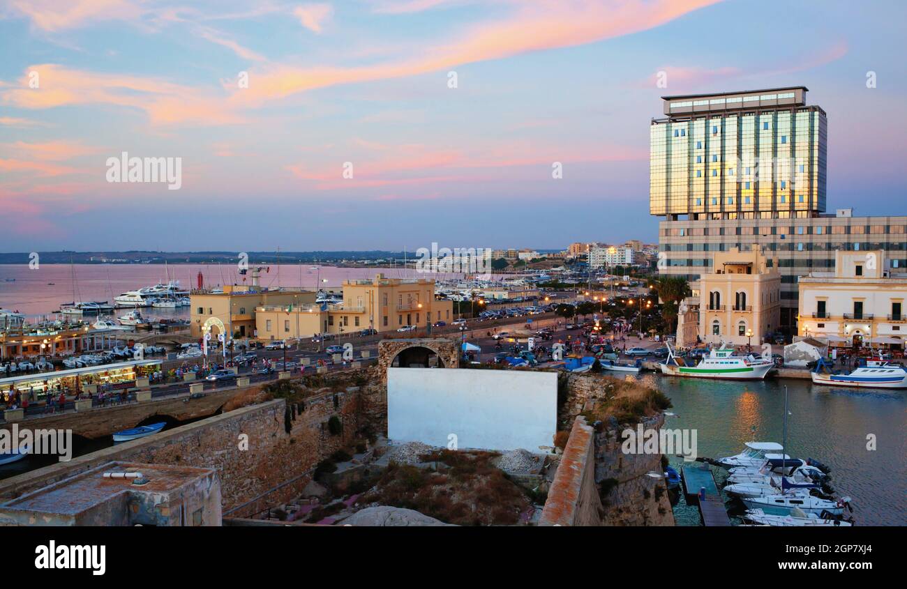 Panoramic view of Gallipoli harbour, ancient and modern buildings on ...