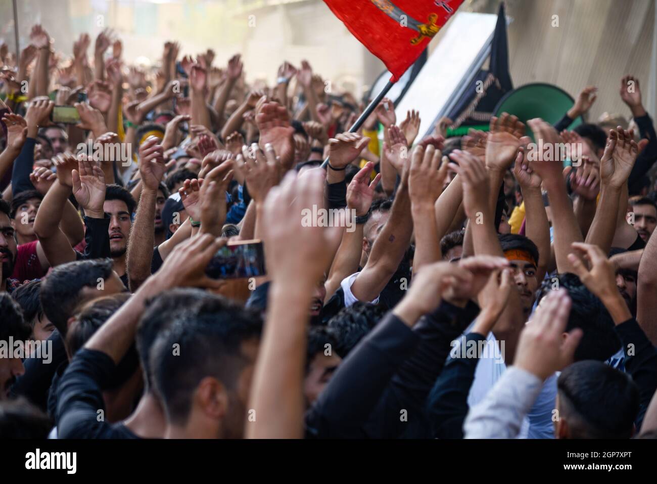 Srinagar, India. 29th Sep, 2021. Shia Muslims raises their hands as ...