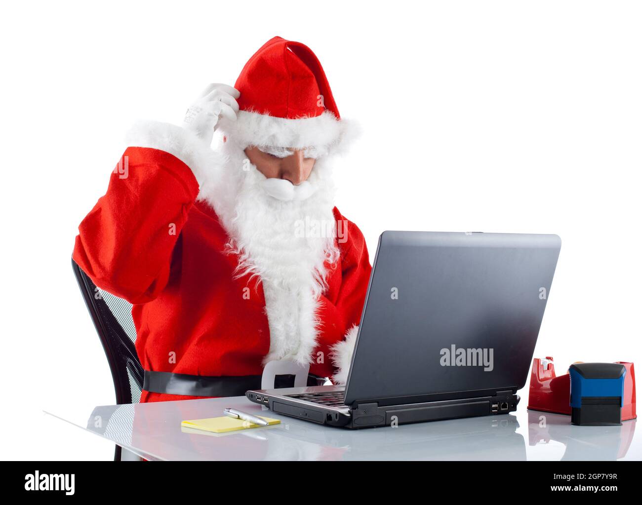 Young Santa Claus with notebook on white background Stock Photo - Alamy