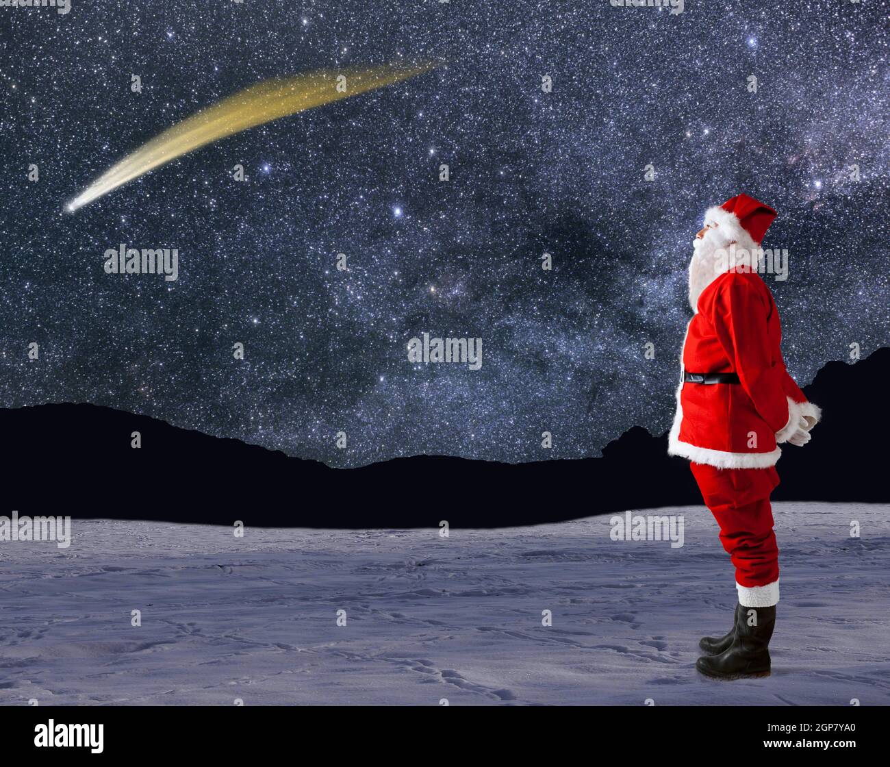 Santa Claus looks at the sky with a shooting star Stock Photo - Alamy