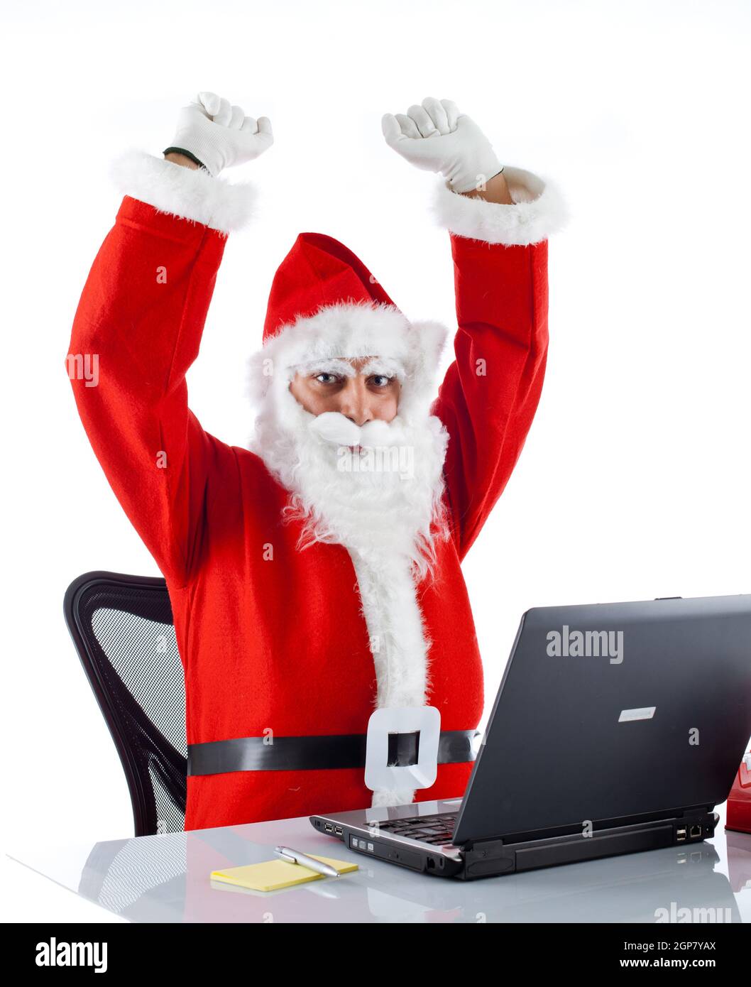 Young Santa Claus with notebook on white background Stock Photo - Alamy
