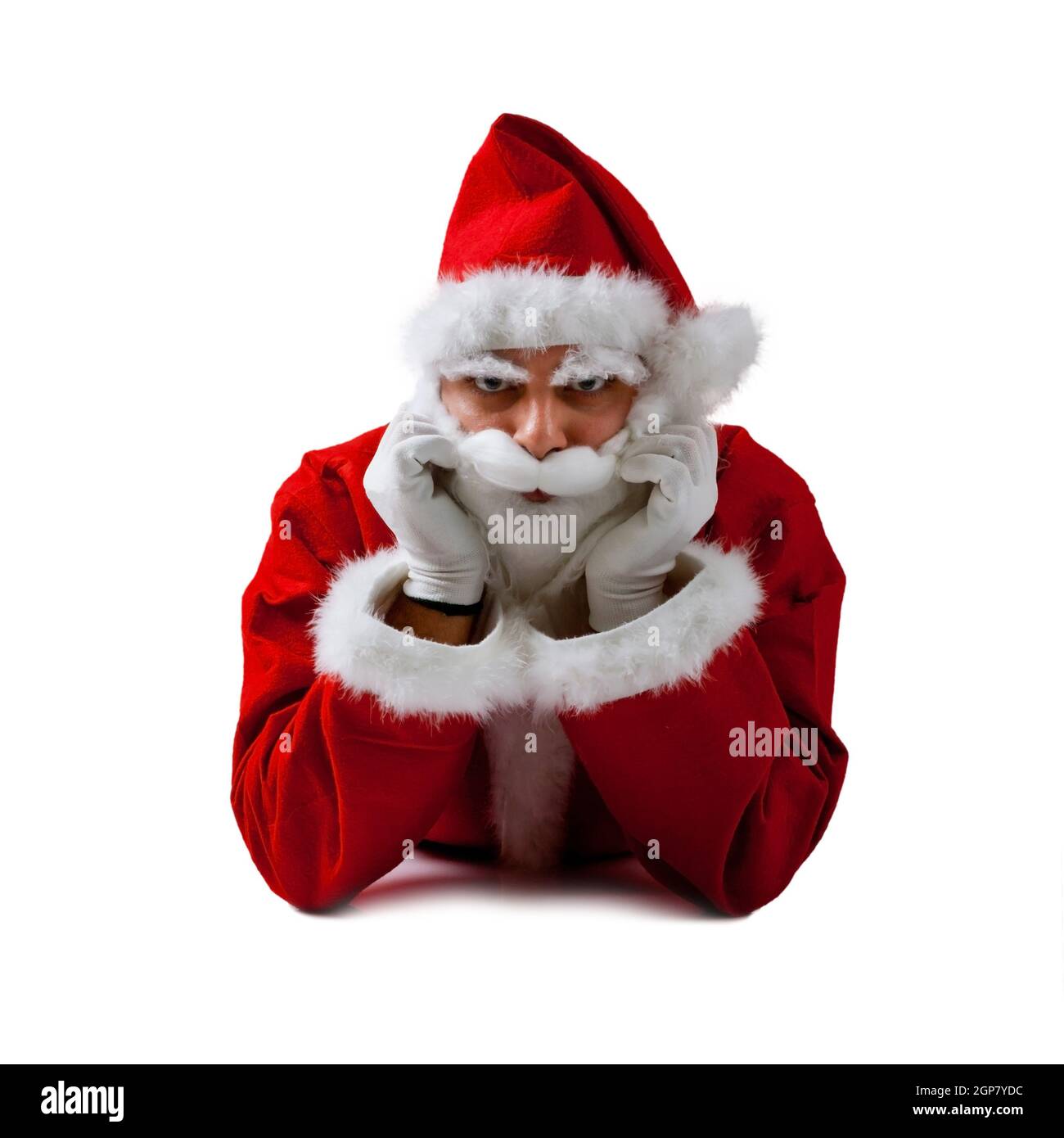 Santa Claus lying down with serious expression Stock Photo - Alamy