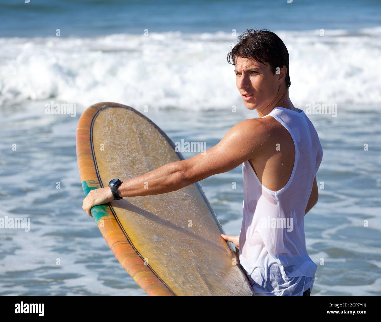 Portrait of Surfer with longboard on the beach Stock Photo - Alamy