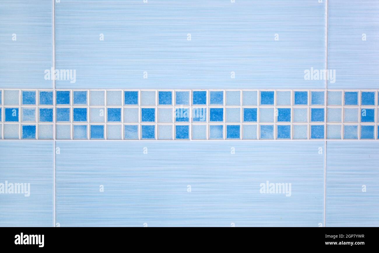 Blue tiles with row mosaic assembled on the bathroom wall Stock Photo ...
