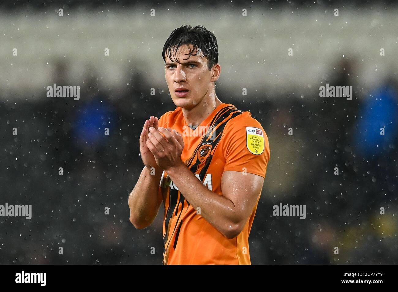 Alfie Jones #5 of Hull City applauds the crowd at the end of the game ...