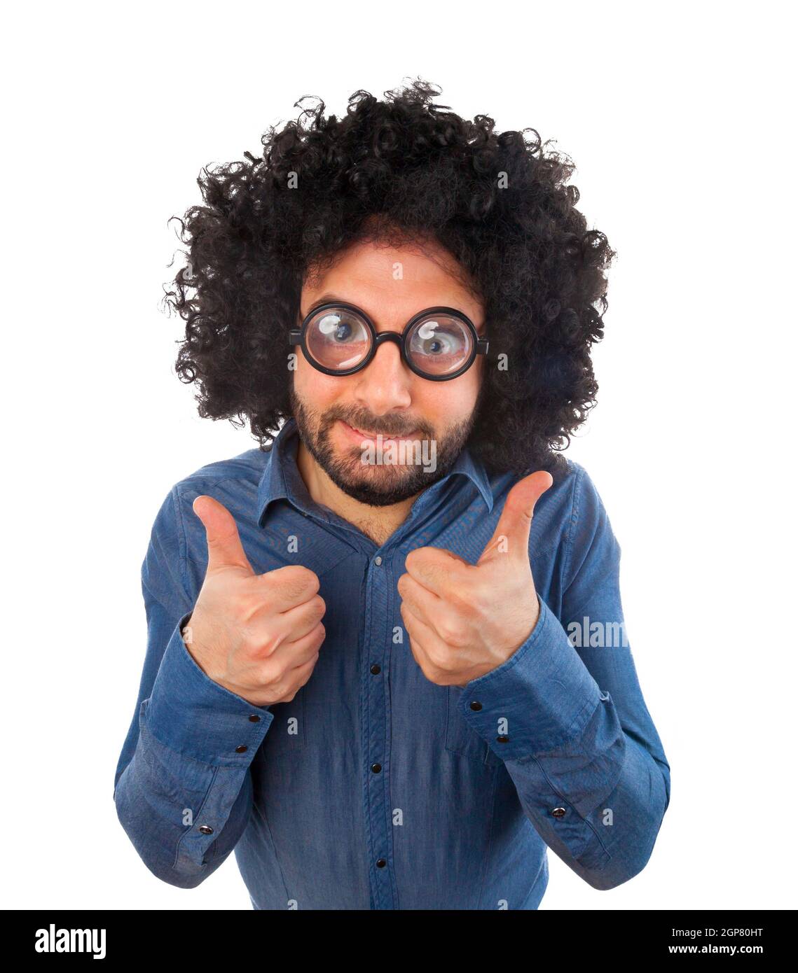 Man with crazy expression and thumb up on white background Stock Photo ...