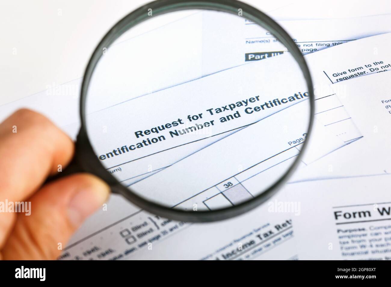 US Individual Tax Return Form 1040 close up with magnifying glass Stock ...