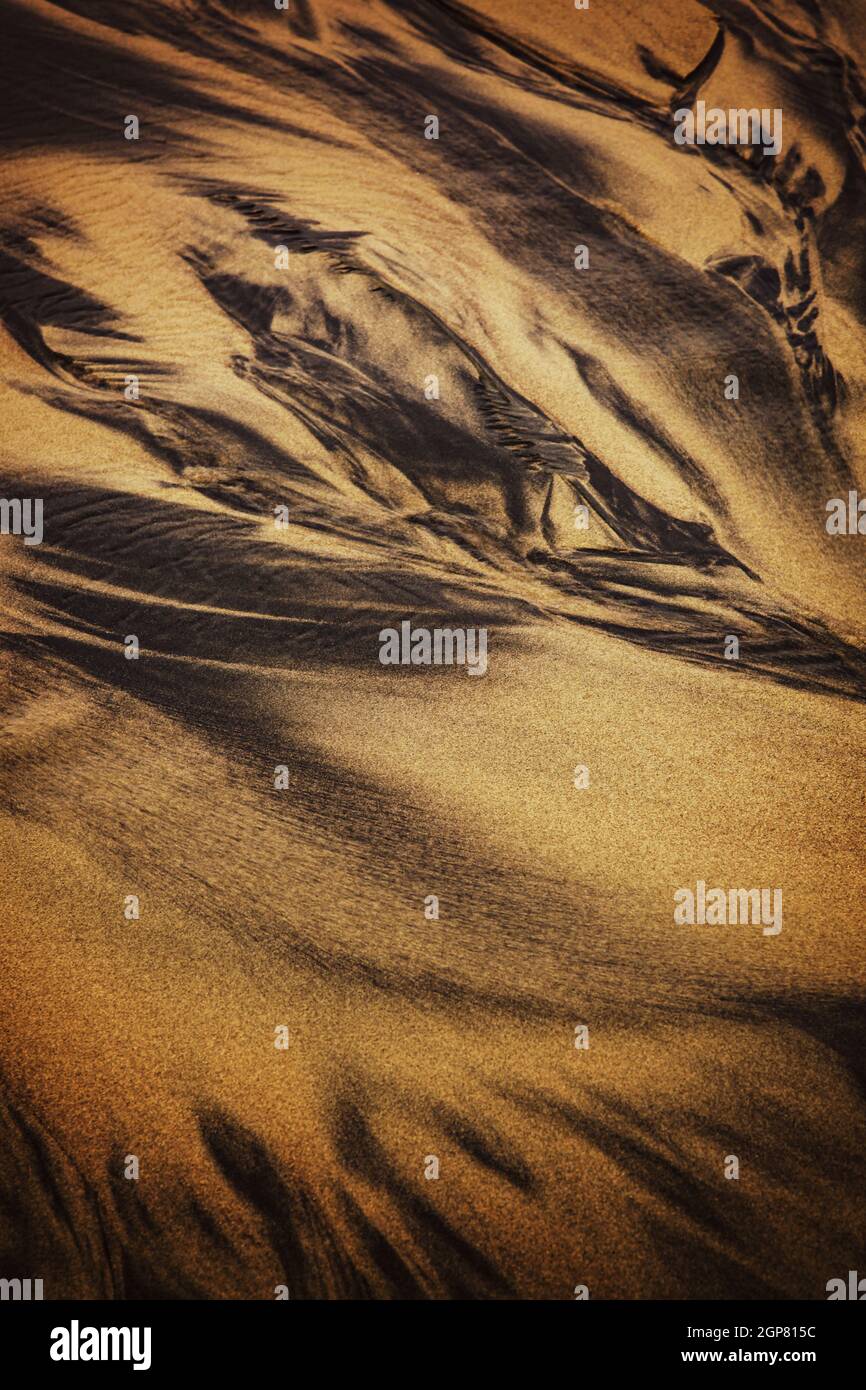 Abstract background with texture and pattern of sand with streaks and ...