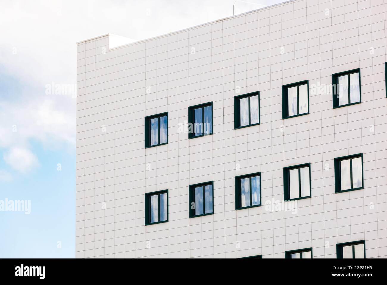 Generic building photographed on a sunny day with clouds Stock Photo ...