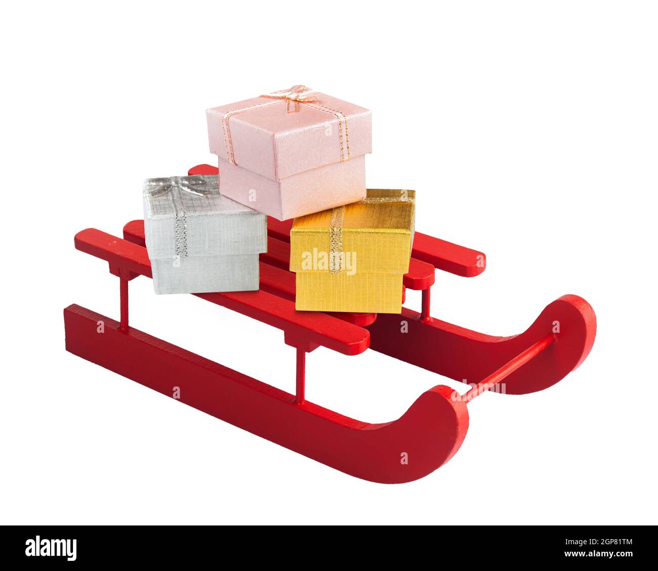 Wooden red sled with gift boxes on white background Stock Photo - Alamy