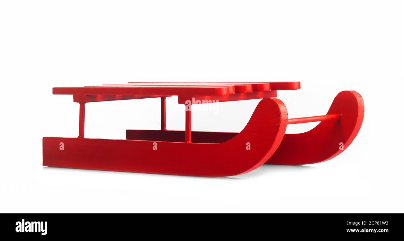 Wooden red sled isolated on white background Stock Photo - Alamy