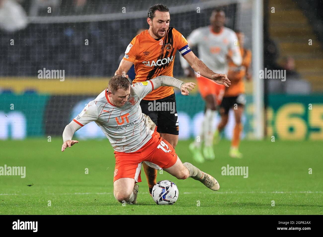 Shayne Lavery #19 of Blackpool fouled by Lewie Coyle #2 of Hull City ...