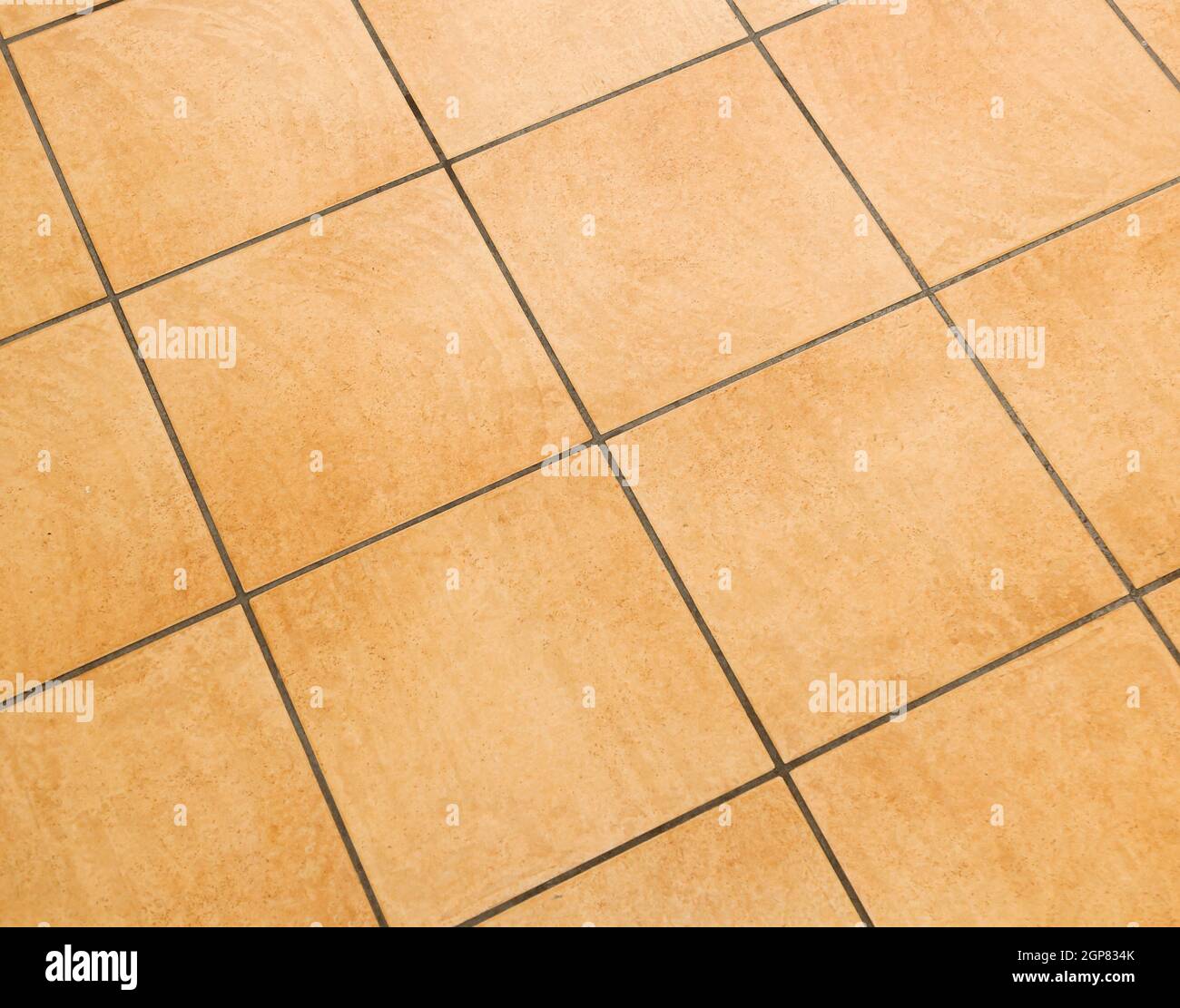 Brown ceramic floor tiles close up texture Stock Photo - Alamy