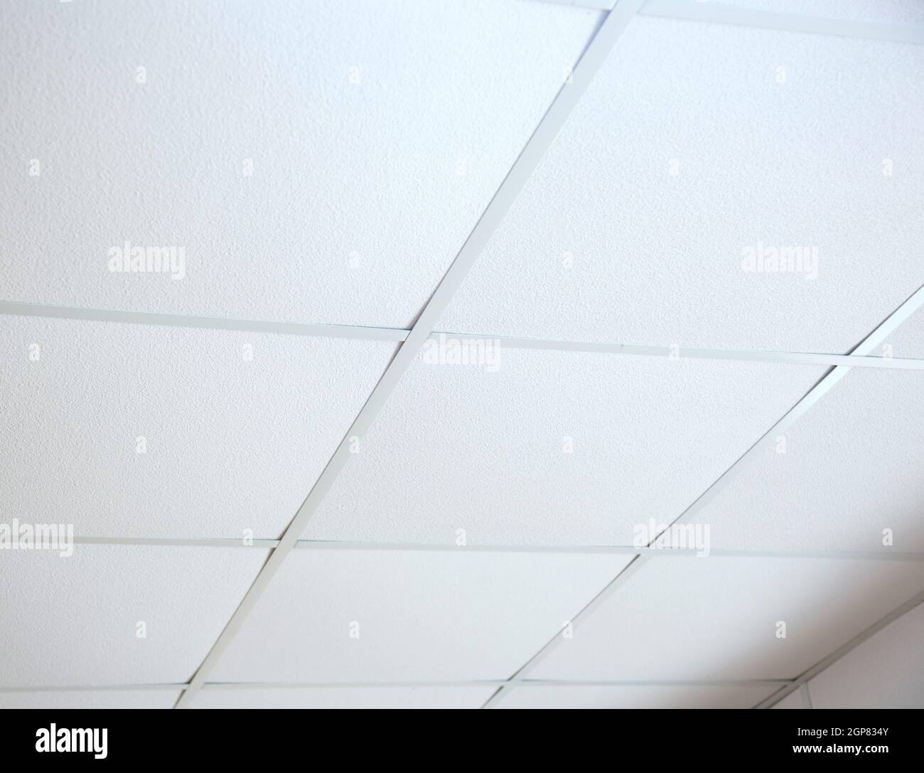 Texture of white panels for suspended ceiling Stock Photo - Alamy