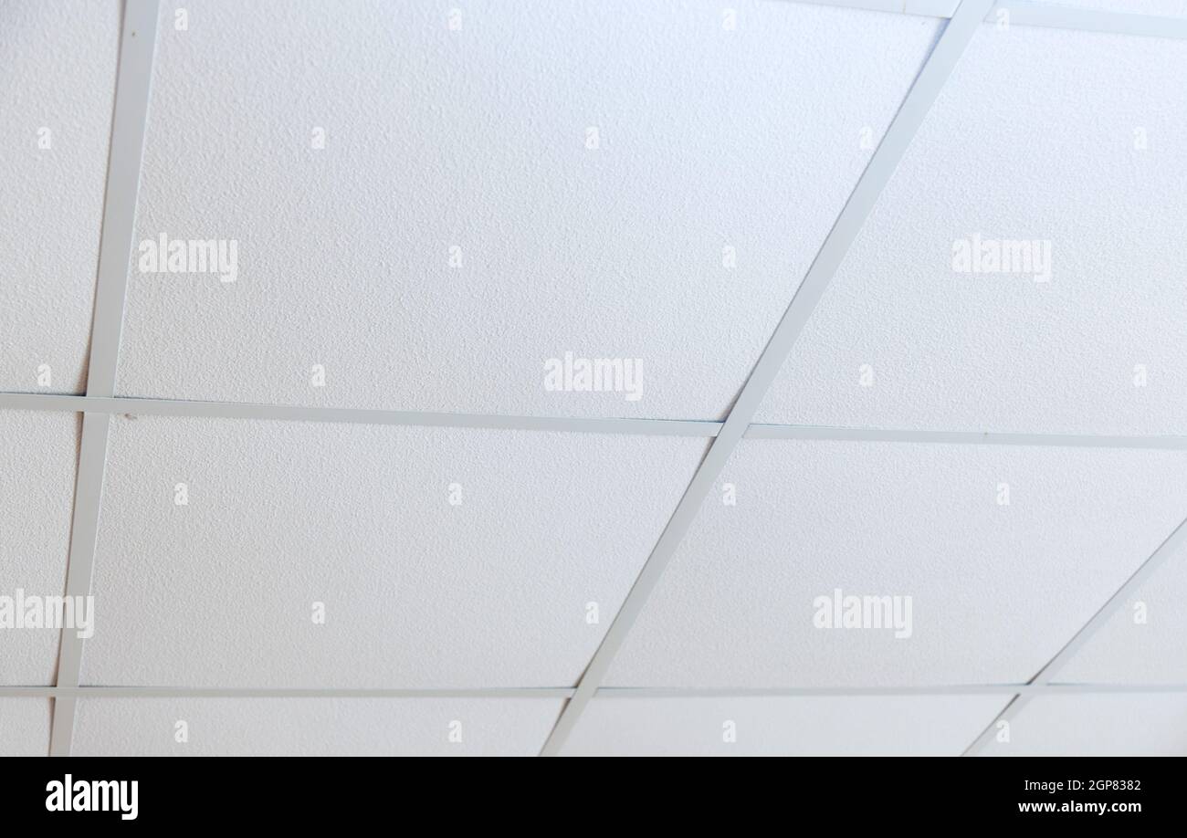 Texture of white panels for suspended ceiling Stock Photo - Alamy