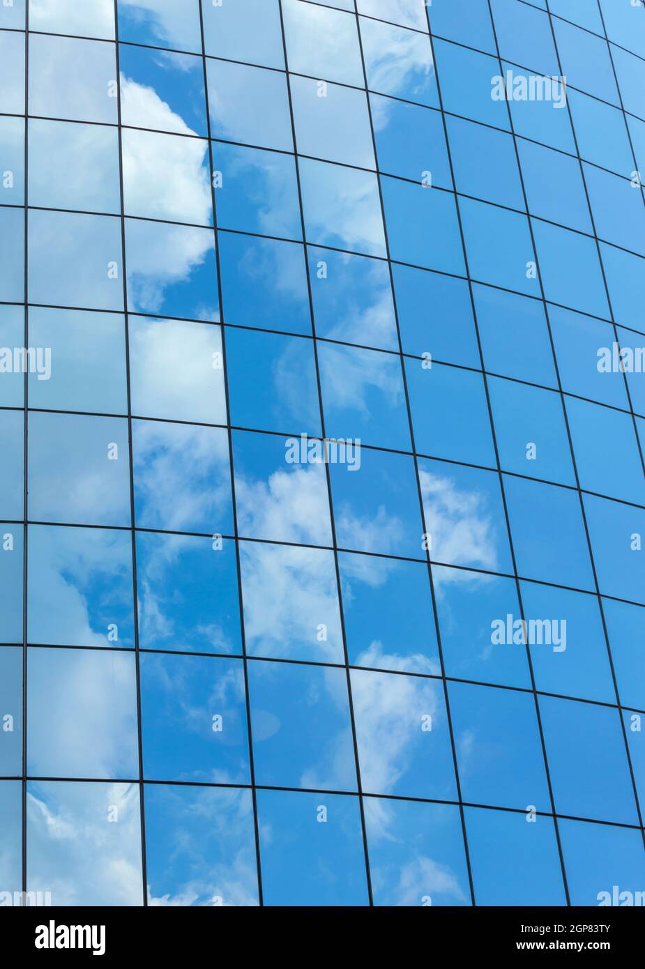 Modern glass skycrapers background with sky and clouds reflection Stock ...