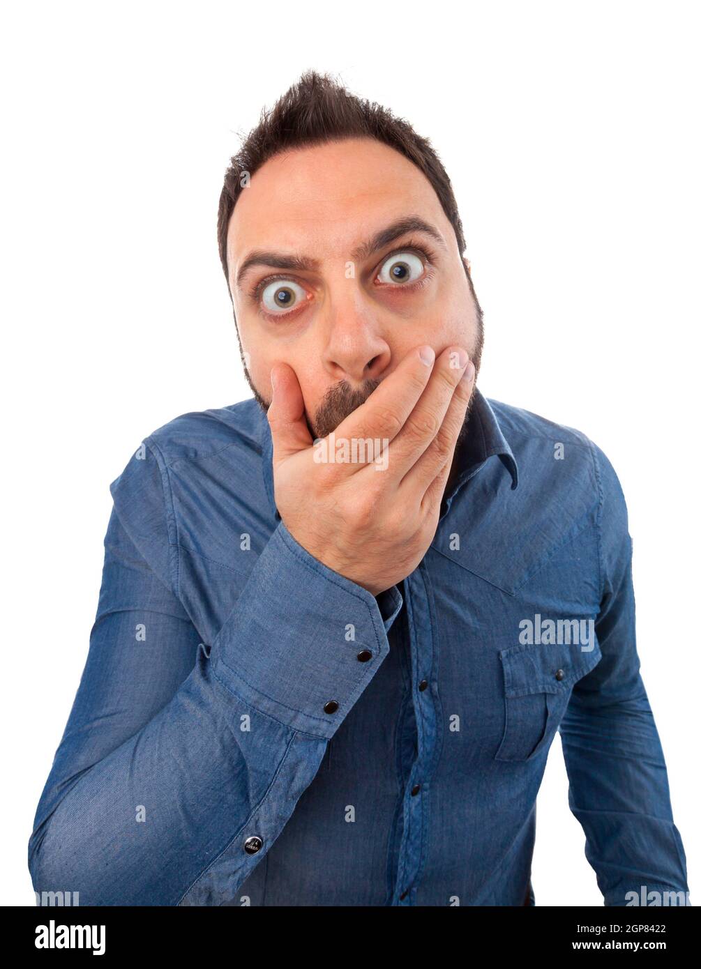 Young man with expression of fright on white background Stock Photo - Alamy
