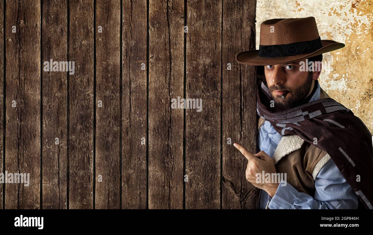 Cowboy gunslinger pointing gun hi-res stock photography and images - Alamy