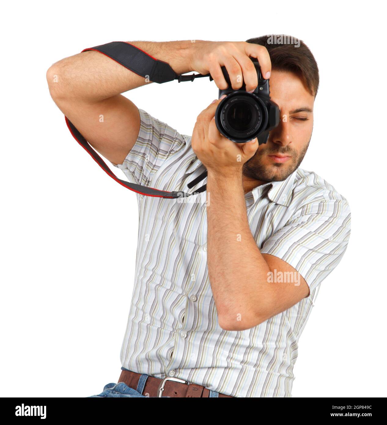 Young man with camera isolated on white background Stock Photo - Alamy