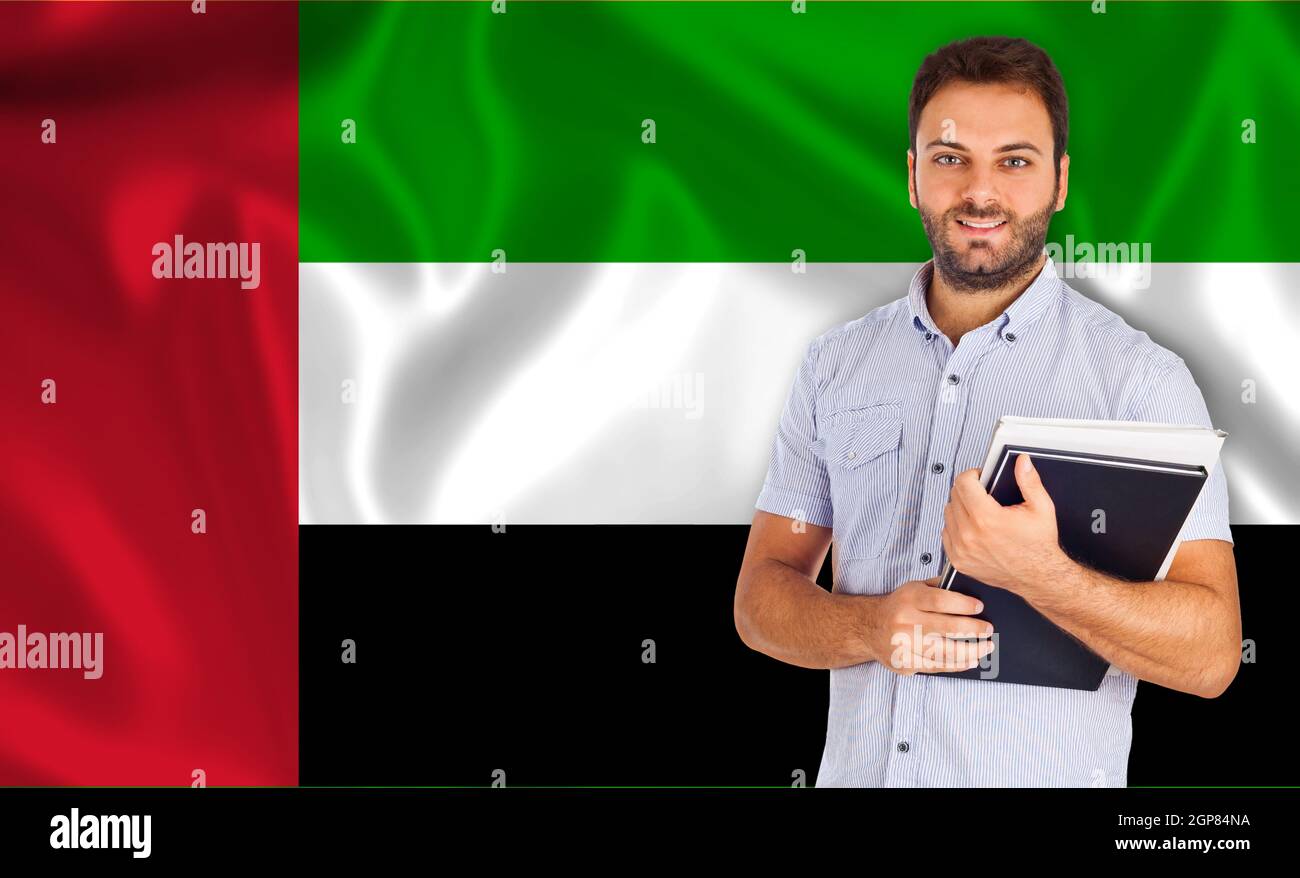 Male student of languages on Arabic flag Stock Photo - Alamy