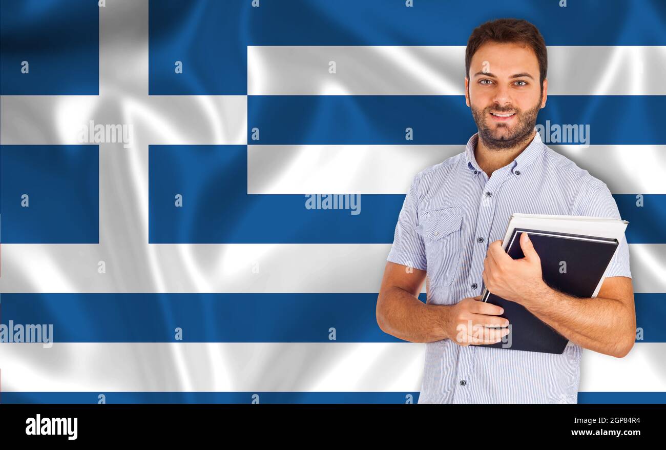 Young smiling student learns greek the language Stock Photo - Alamy