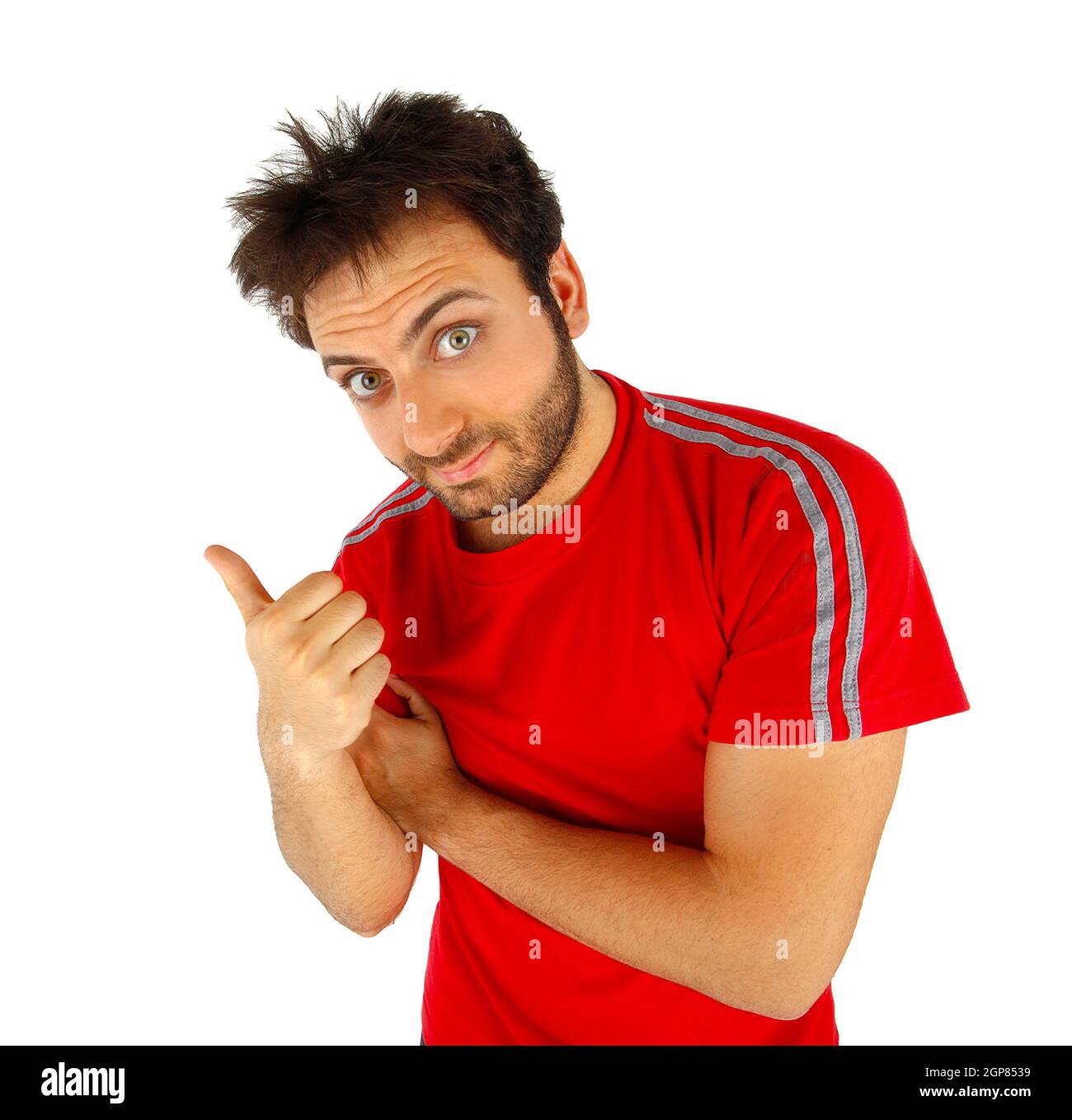 Man pointing with red t-shirt on white background Stock Photo - Alamy