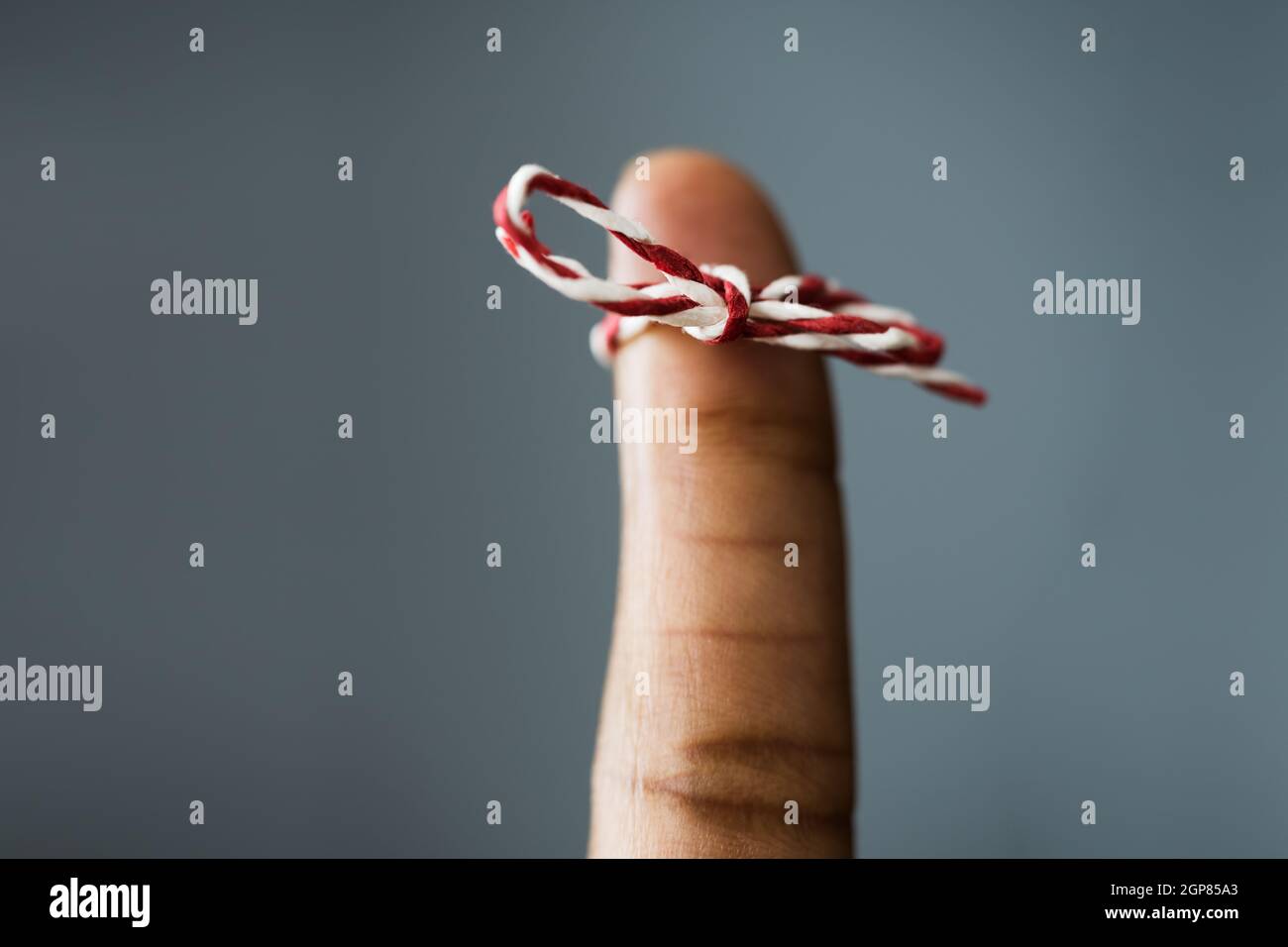 Black woman with string tied to finger hi-res stock photography and ...