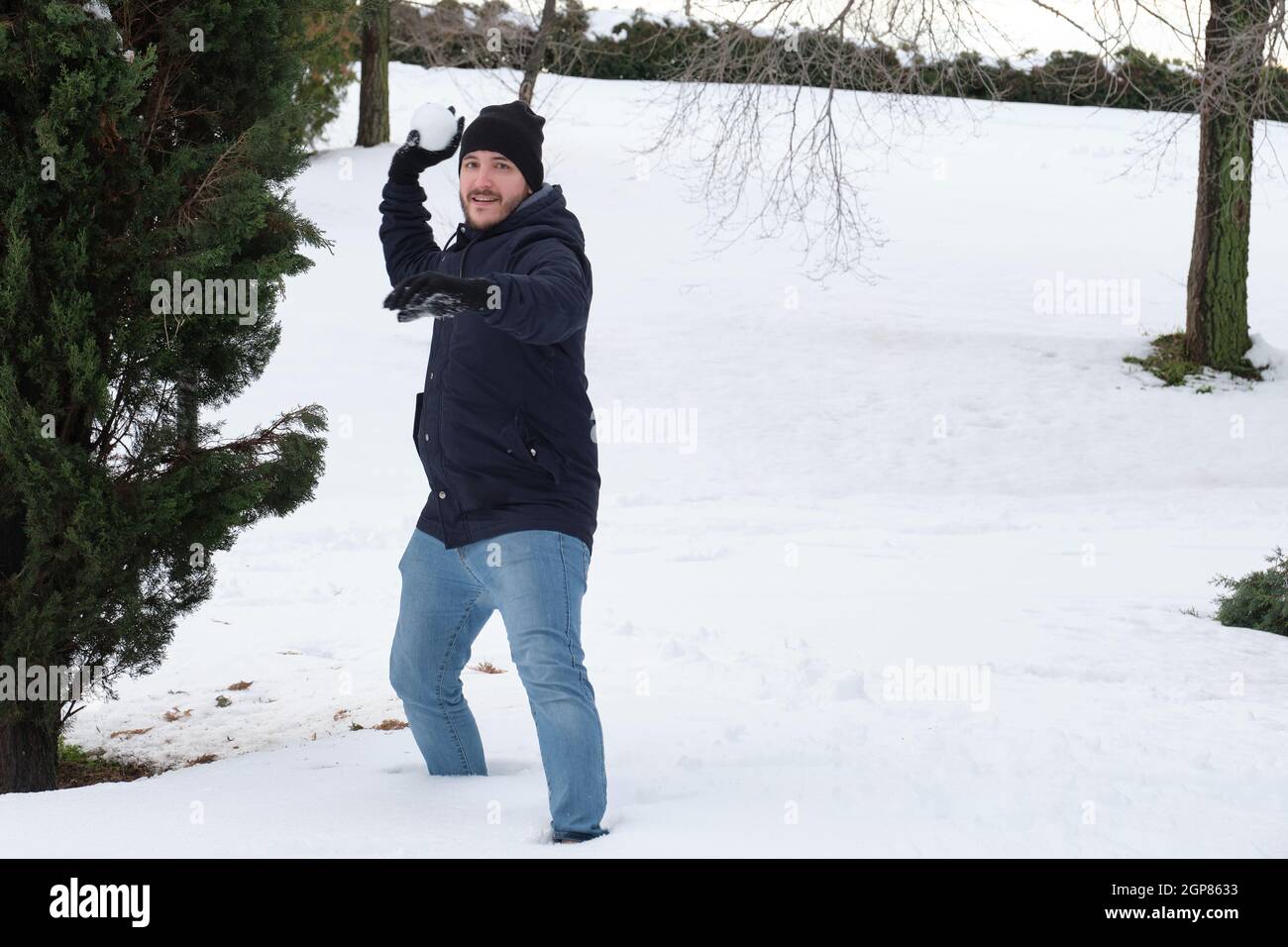 Man throwing a snowball hi-res stock photography and images - Alamy