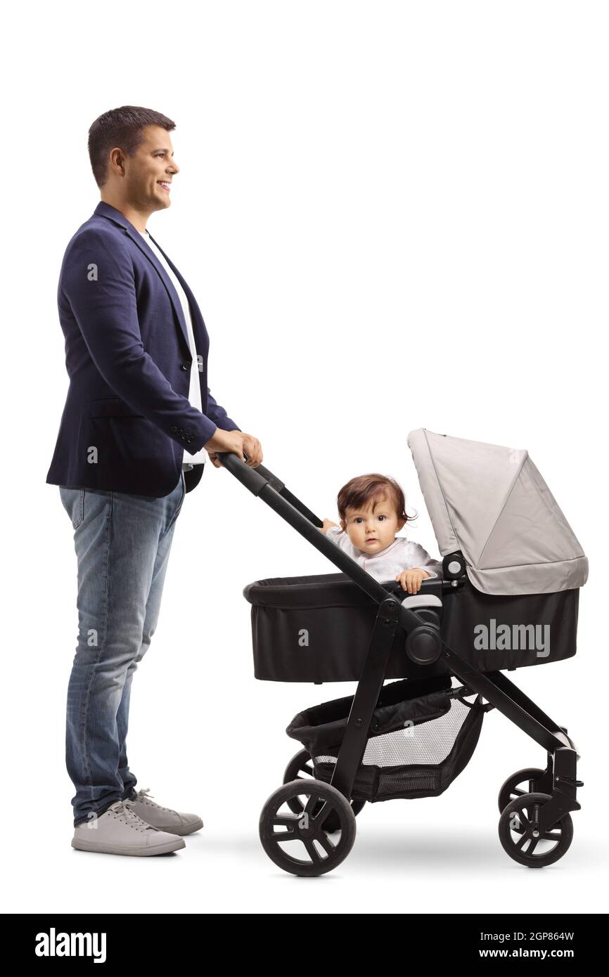 Full length profile shot of a young father with a cute baby in a ...