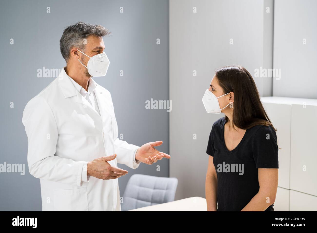 Doctor Health Care Questions In Hospital Or Clinic In Face Mask Stock ...